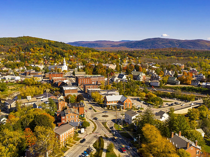 Aerial View: From above, Middlebury reveals its perfect nestling between Vermont's rolling hills, a community that found its place and decided to make it beautiful.