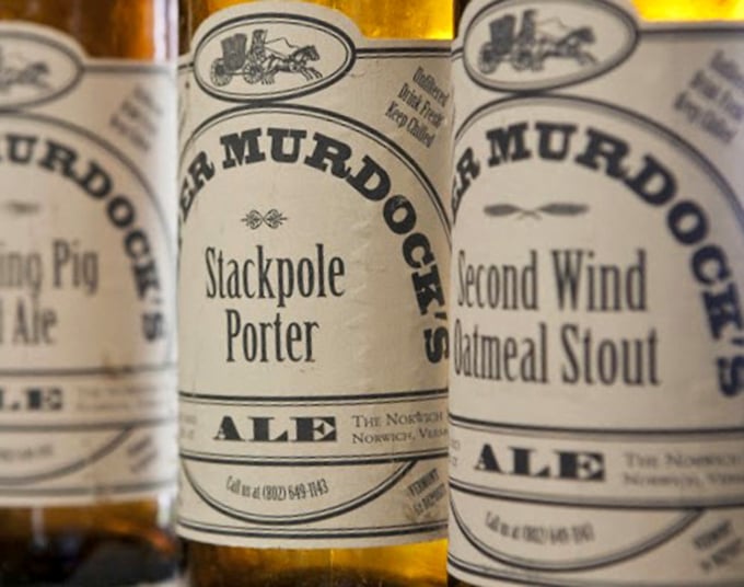 Murdock's signature ales line up like soldiers, each bottle promising a unique taste of Vermont's craft brewing heritage.
