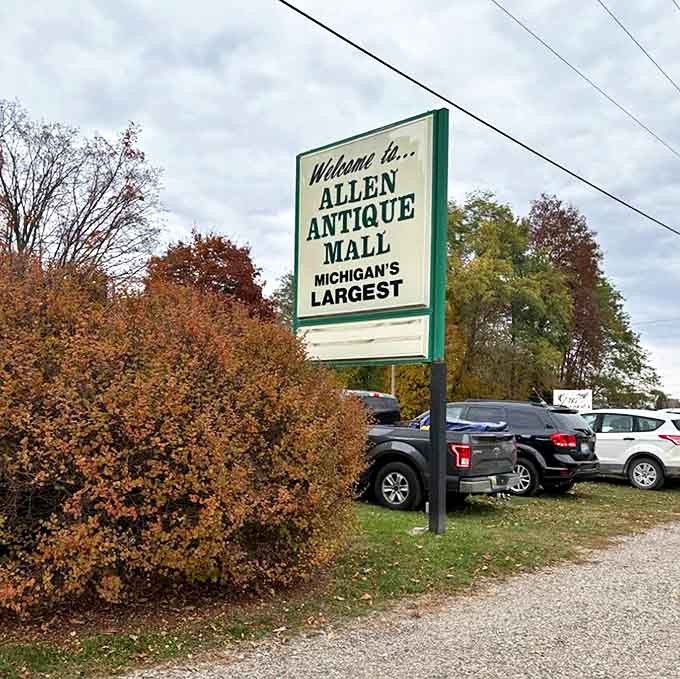 The roadside sign beckons collectors and casual browsers alike – a portal to Michigan's self-proclaimed antique capital where treasures await discovery.