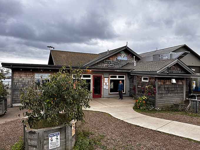 The storefront welcomes visitors with weathered charm, promising fresh fish and lake views just beyond the door.