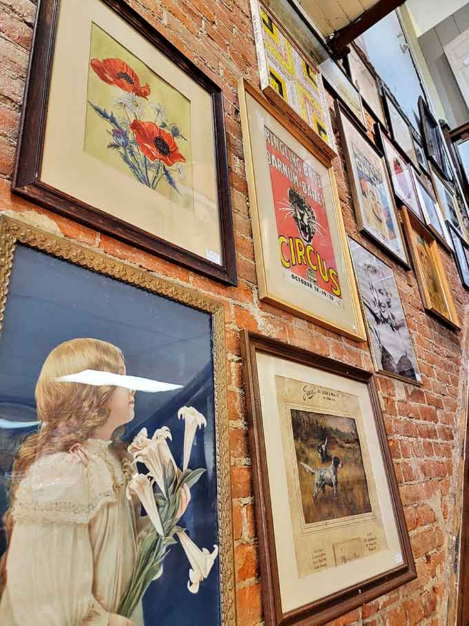 Framed artwork transforms brick walls into galleries of nostalgia, where every painting tells a story from another time.