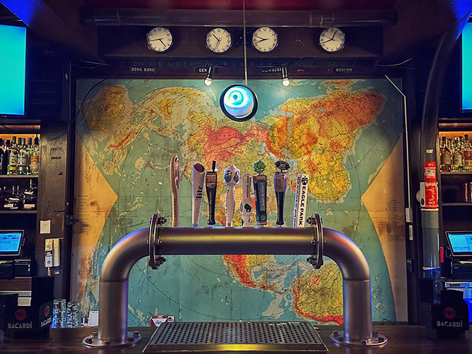 The world map and multiple time zone clocks behind the bar &ndash; because international espionage waits for no one.