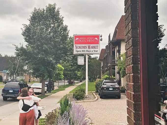 Bold signage announces Berry Sweet Kitchen and Nokomis Market, because sometimes the best destinations are worth advertising, even in small letters.