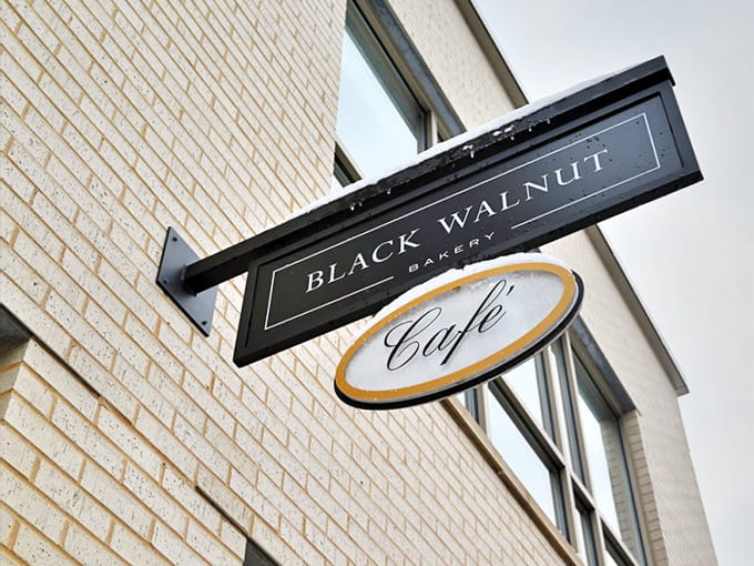 The sign says it all: this is where the magic happens, one pastry at a time.