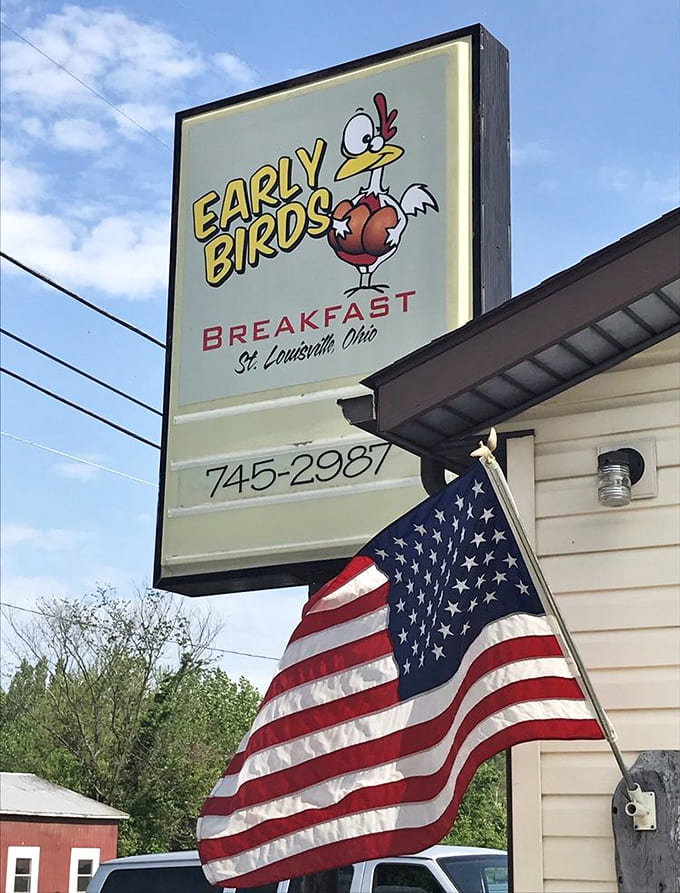 The Early Birds sign with its cartoon mascot promises exactly what it delivers: a place where showing up early means you get the worm, or in this case, incredible breakfast.