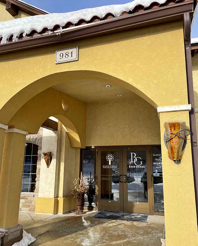 The inviting entrance with its Mediterranean-inspired arches promises that something delicious is waiting just beyond those doors, and it delivers on that promise.