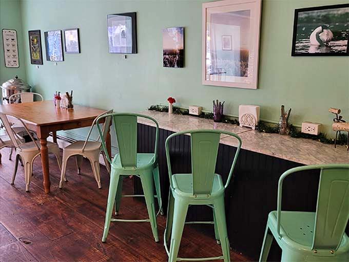 Mint green chairs invite you to linger over that second slice of pie. The hardest decision? When to finally leave.