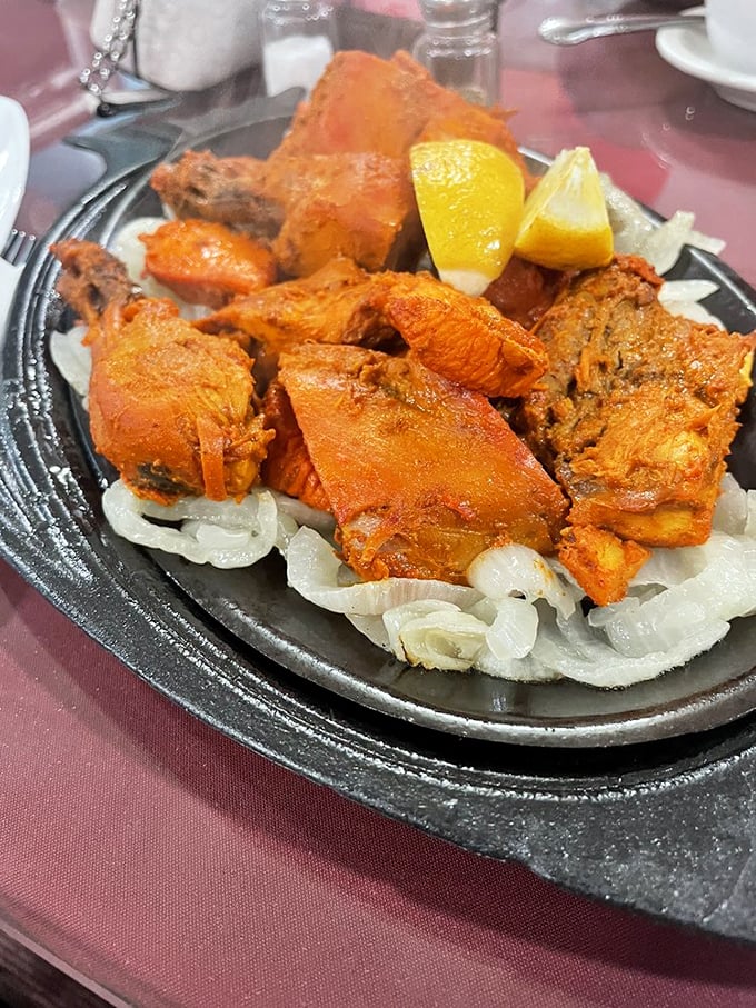 Red alert, flavor incoming! Tandoor's namesake chicken is a smoky, spicy masterpiece that puts ordinary grilled chicken to shame.