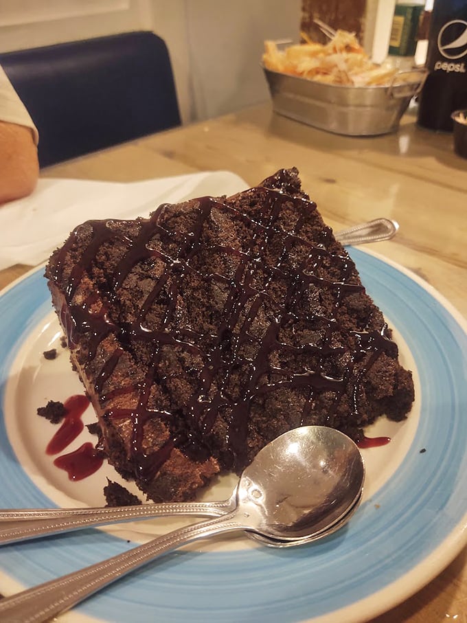 Chocoholics, rejoice! This decadent chocolate cake is so rich and moist, it might just overshadow the seafood &ndash; almost.