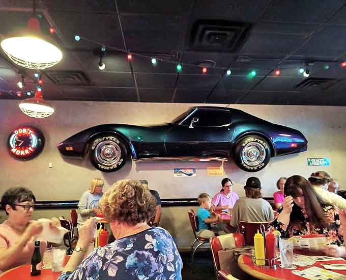 A classic Corvette mounted on the wall reminds diners that American excellence comes in many forms, from muscle cars to perfectly executed comfort food served with genuine hospitality.