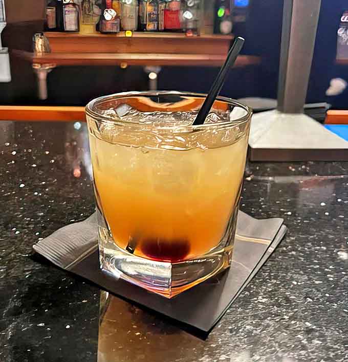 This isn't just a cocktail &ndash; it's liquid amber that promises to smooth conversation and complement the culinary journey ahead.