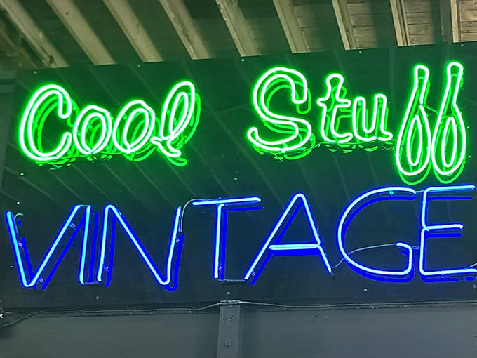 Signage: The neon doesn't lie &ndash; this is indeed where "Cool Stuff" lives. The vibrant green and blue glow beckons vintage hunters from across the store.