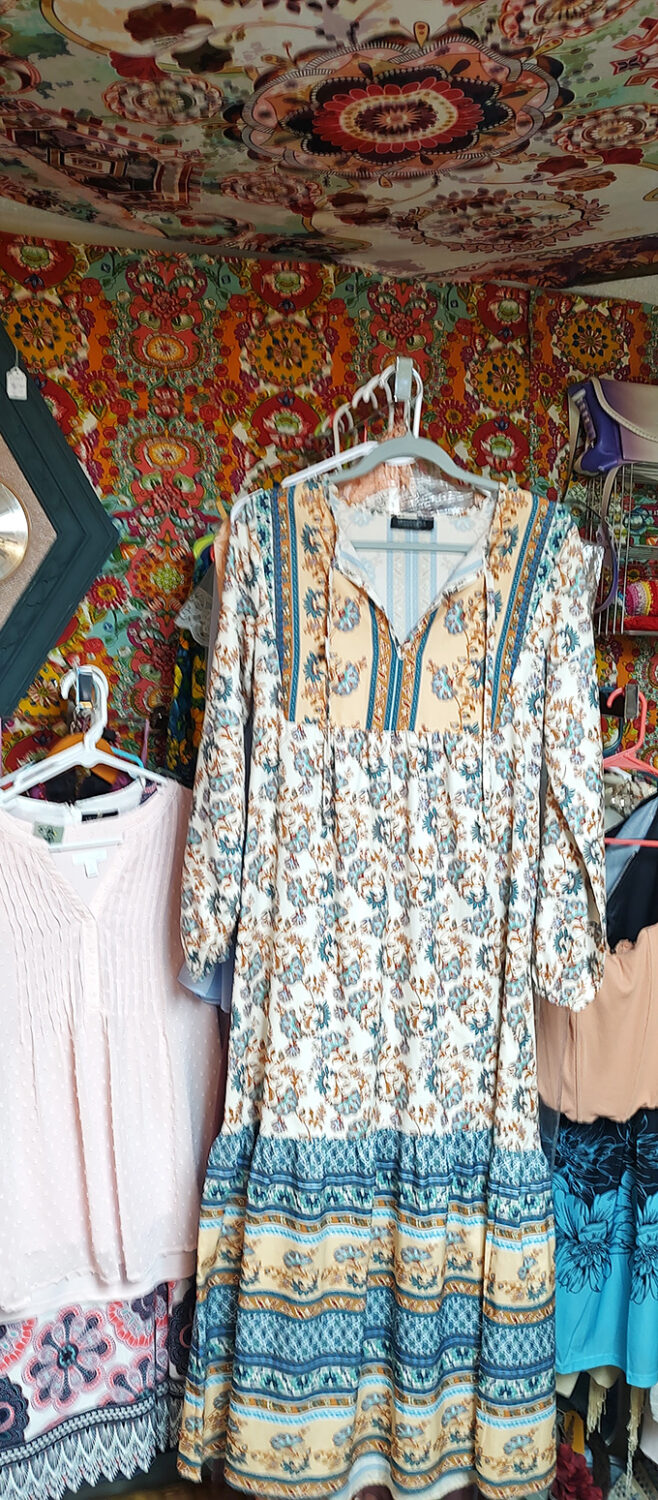 Vintage fashion finds hang against colorful backdrops, proving that yesterday's styles make today's most unique fashion statements. 