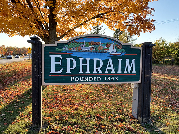 The village welcome sign in autumn glory &ndash; your first hint that Ephraim isn't just another dot on Wisconsin's map.