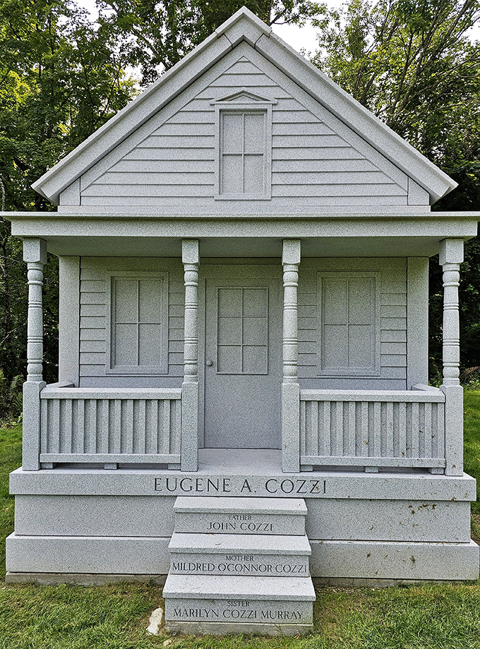 The Cozzi monument recreates a family home in miniature, complete with porch and windows &ndash; a granite house that will never need maintenance.