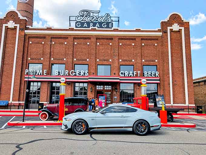 The brick exterior proudly announces "Prime Burgers" and "Craft Beer," promising exactly what Ford's Garage delivers best.