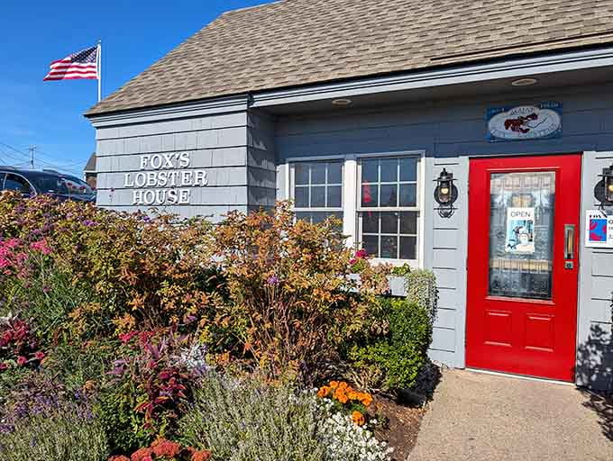 The welcoming entrance with its bright red door invites you into seafood paradise, right next to one of Maine's most photographed lighthouses.