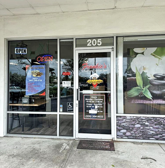 The welcoming entrance promises authentic Italian delights within – a portal to some of the best pizza you'll find in Florida.