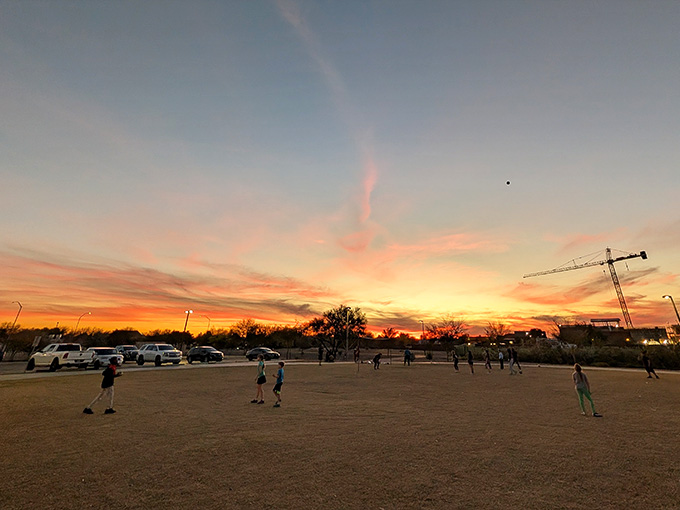 As the sun sets over Signal Butte Park, the playground transforms into a silhouette against the spectacular Arizona sky, ending perfect days.