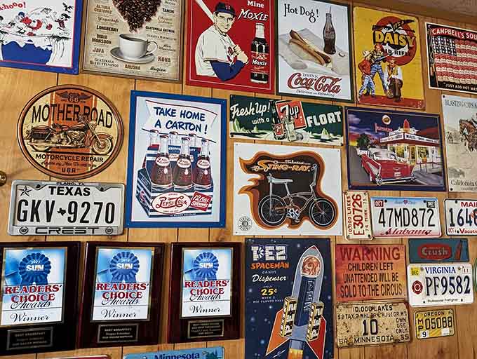 The walls are a museum of Americana, featuring vintage signs, license plates, and memorabilia that make waiting for your food an adventure.