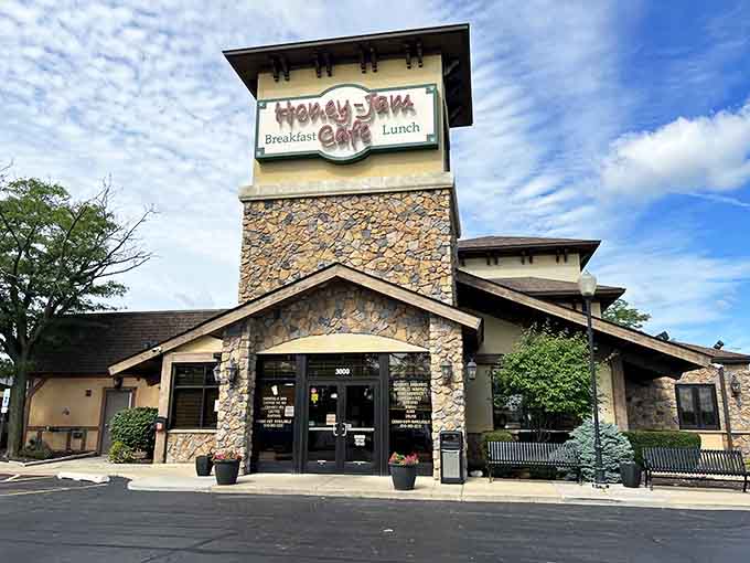 Charming exterior with tower and stone facade stands ready to serve your next memorable breakfast.