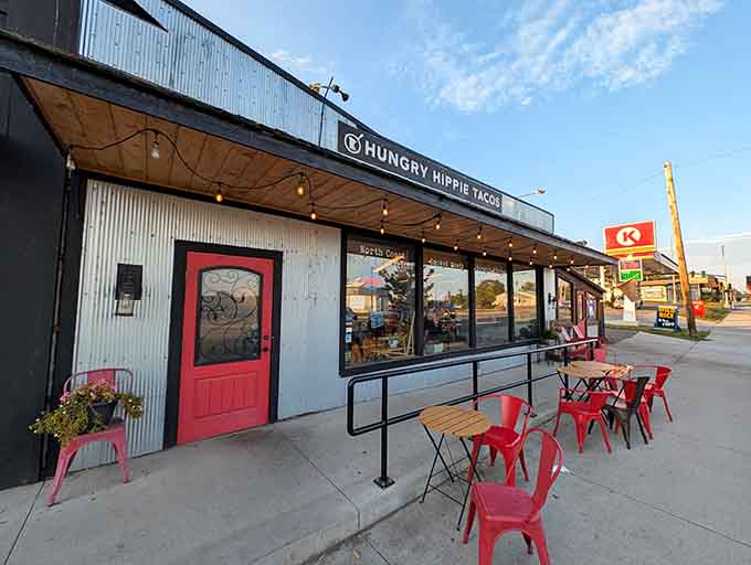 The exterior at dusk shows off those string lights and welcoming atmosphere that makes Hungry Hippie Tacos a North Shore destination worth finding.