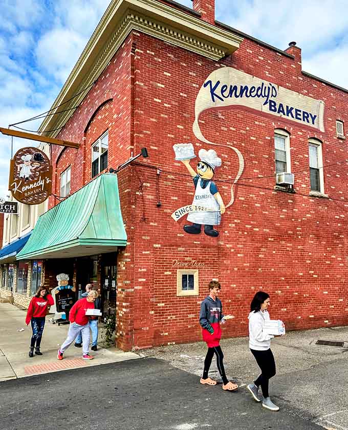 The full exterior view shows off Kennedy's corner location and that "happy place" mural, which is truth in advertising if there ever was such a thing.