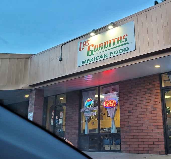 As evening approaches, the glowing OPEN sign beckons hungry diners to discover why people drive hours for these famous Chile Rellenos.
