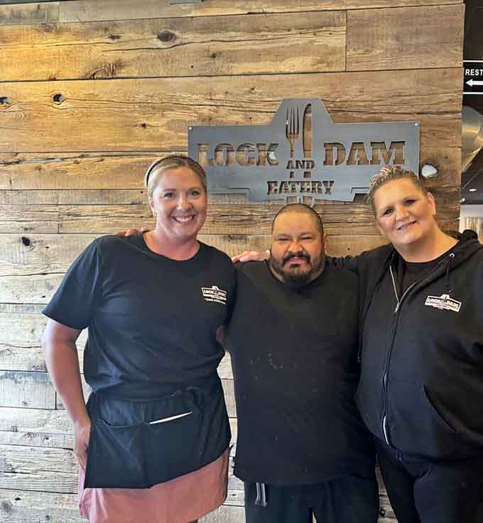 The smiling staff members represent the genuine hospitality that makes Lock and Dam Eatery more than just a restaurant, it's a community.