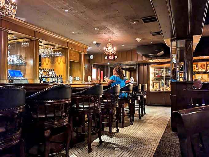 The bar area invites lingering &ndash; polished wood, comfortable seating, and bartenders who remember your name and your drink.