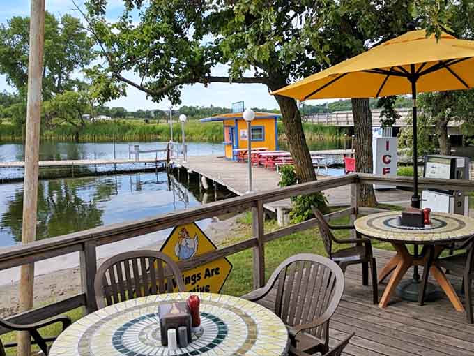The patio offers front-row seats to lake life, where your biggest decision is wings or more wings.