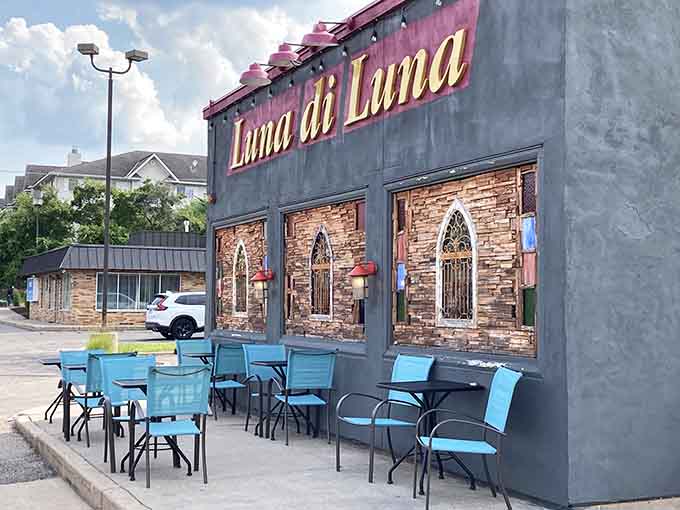 The outdoor patio with turquoise chairs offers a cheerful spot for al fresco dining when Minnesota weather cooperates.