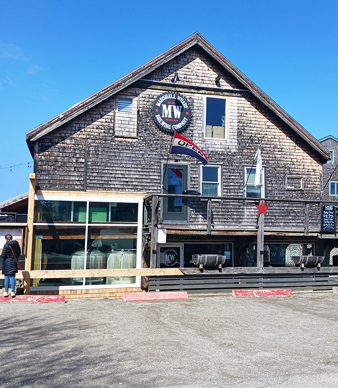 Marshall Wharf Brewing Company's weathered exterior houses innovative craft beers, proving that great taste often comes in rustic packages.