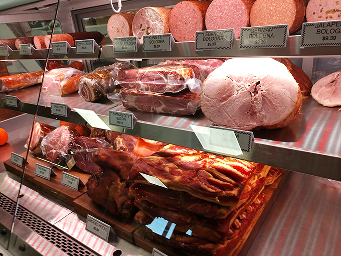 Meat masterpiece in progress! This display case is like a butcher's art gallery, showcasing nature's most delicious canvases.