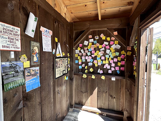 The wall of colorful sticky notes serves as a community guestbook, each one a love letter to pie that changed someone's day&mdash;or life.
