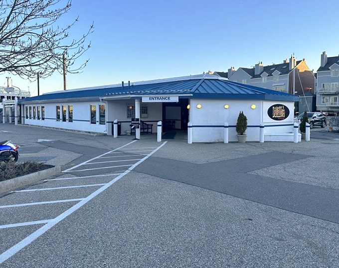 DiMillo's exterior welcomes hungry travelers with its distinctive blue roof and promise of seafood treasures within.