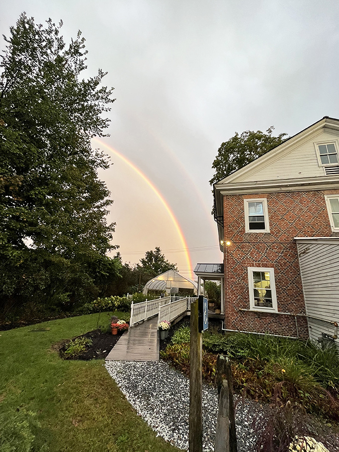 Even Mother Nature wants to dine here&mdash;sending rainbows as her reservation request to this charming Vermont farmhouse. Photo credit: <a href="https://www.google.com/maps/contrib/107245190237299058469/photos/@44.424449,-73.0132741,17z/data=!3m1!4b1!4m3!8m2!3m1!1e1?entry=ttu&g_ep=EgoyMDI1MTIwOC4wIKXMDSoASAFQAw%3D%3D" target="_blank" rel="noopener noreferrer">The Kitchen Table</a>