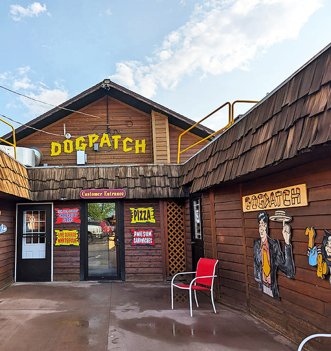 The wooden exterior with its bright signage beckons hungry travelers—a rustic oasis of good food and warm welcomes in Michigan's beautiful north.