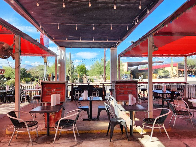 Desert plants frame the outdoor dining area, reminding you that this slice of Americana thrives in Arizona's distinctive landscape.
