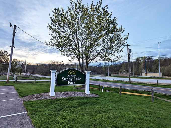 The welcoming sign that promises exactly what it delivers &ndash; a sunny disposition at a lovely lake in Aurora.