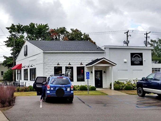 The parking area &ndash; first stop on the pilgrimage to pastry perfection, where cars gather like faithful worshippers at the temple of fried dough.