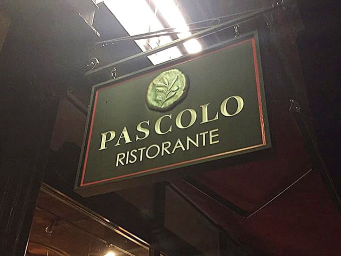 The Pascolo sign hangs proudly, marking the spot where New England's best Chicken Marsala patiently awaits discovery.