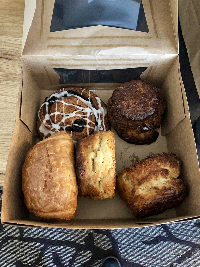 A cardboard treasure chest filled with buttery, flaky reasons to abandon any notion of a carb-free existence.