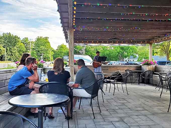 The outdoor patio, where summer evenings become magical under string lights and the soundtrack of live music and happy diners.