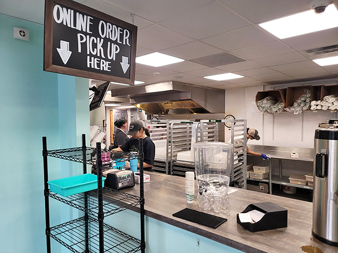 The pickup area for online orders &ndash; where smart locals bypass the line, having planned their donut acquisition with the strategic precision of a military operation.