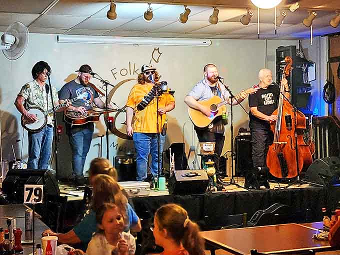 A five-piece band brings bluegrass energy to the intimate stage, where every banjo pick and harmony feels like it's performed just for you.