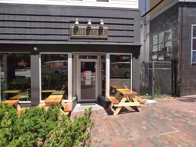 The entrance welcomes visitors with picnic tables and an open-door policy that says "come on in, we've been waiting for you."