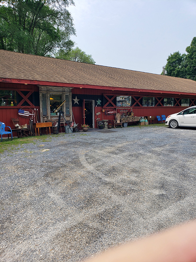 The exterior view reveals the classic red barn styling &ndash; Vermont's version of "nothing to see here" when there's everything to see inside.