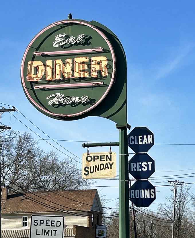 That classic diner sign promises clean restrooms and Sunday openings, the kind of straightforward hospitality that never goes out of style.