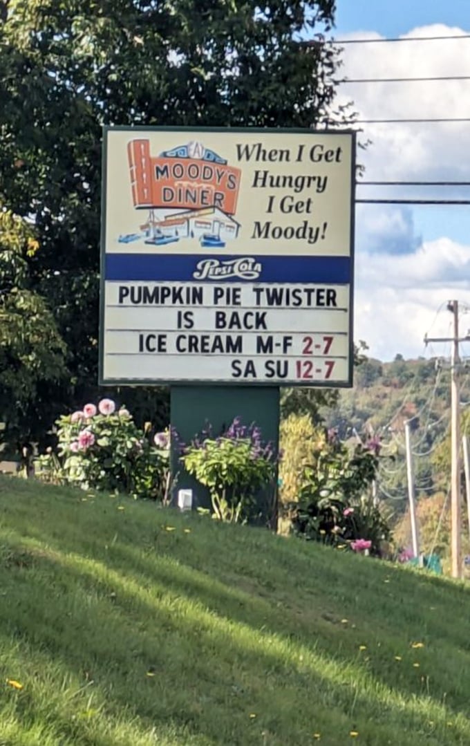 Roadside charm that's stood the test of time: Moody's white clapboard exterior and vintage sign welcome hungry travelers.